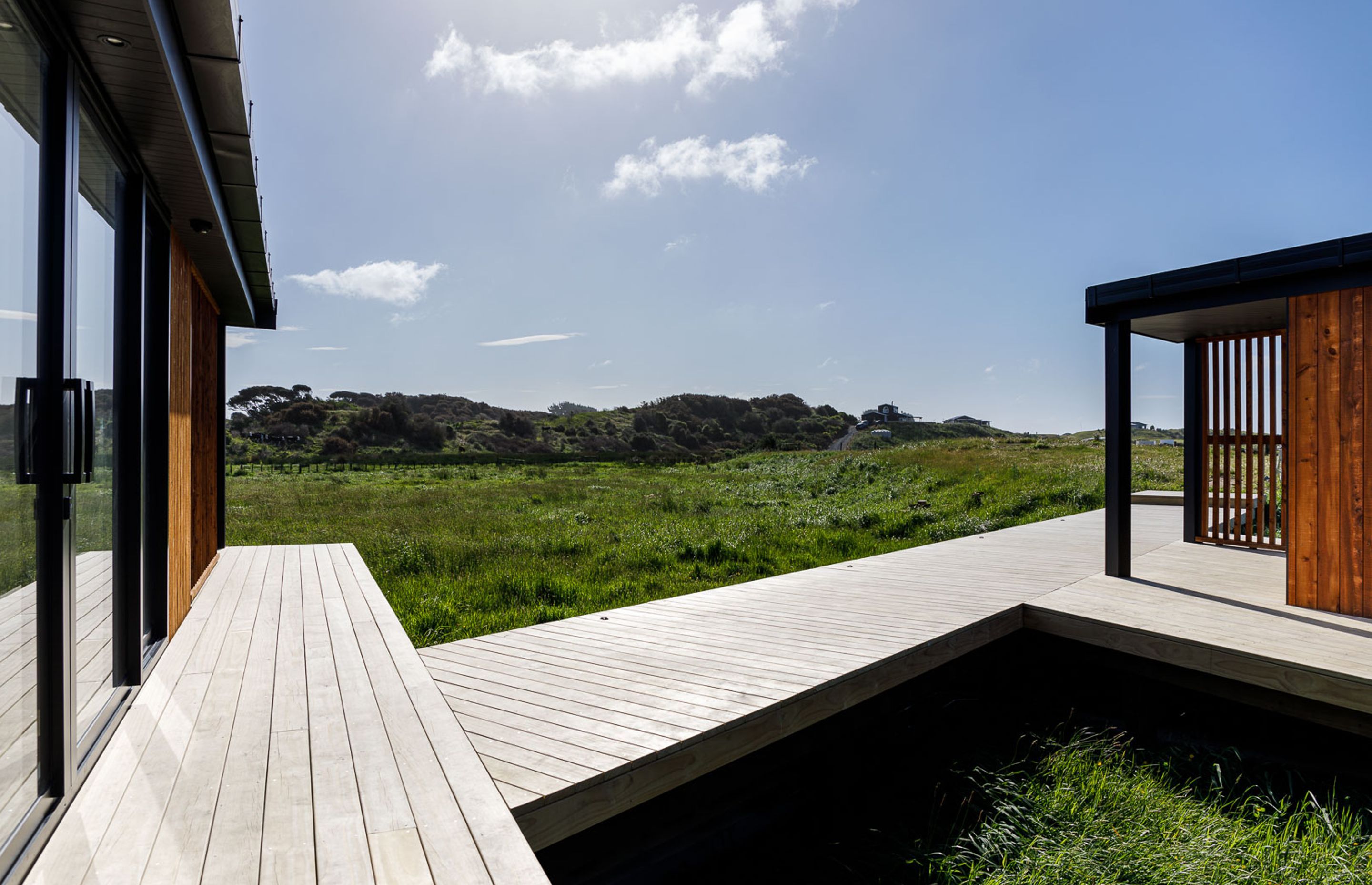 Waikawa Beach Bach by André Vroon Photographer | ArchiPro NZ