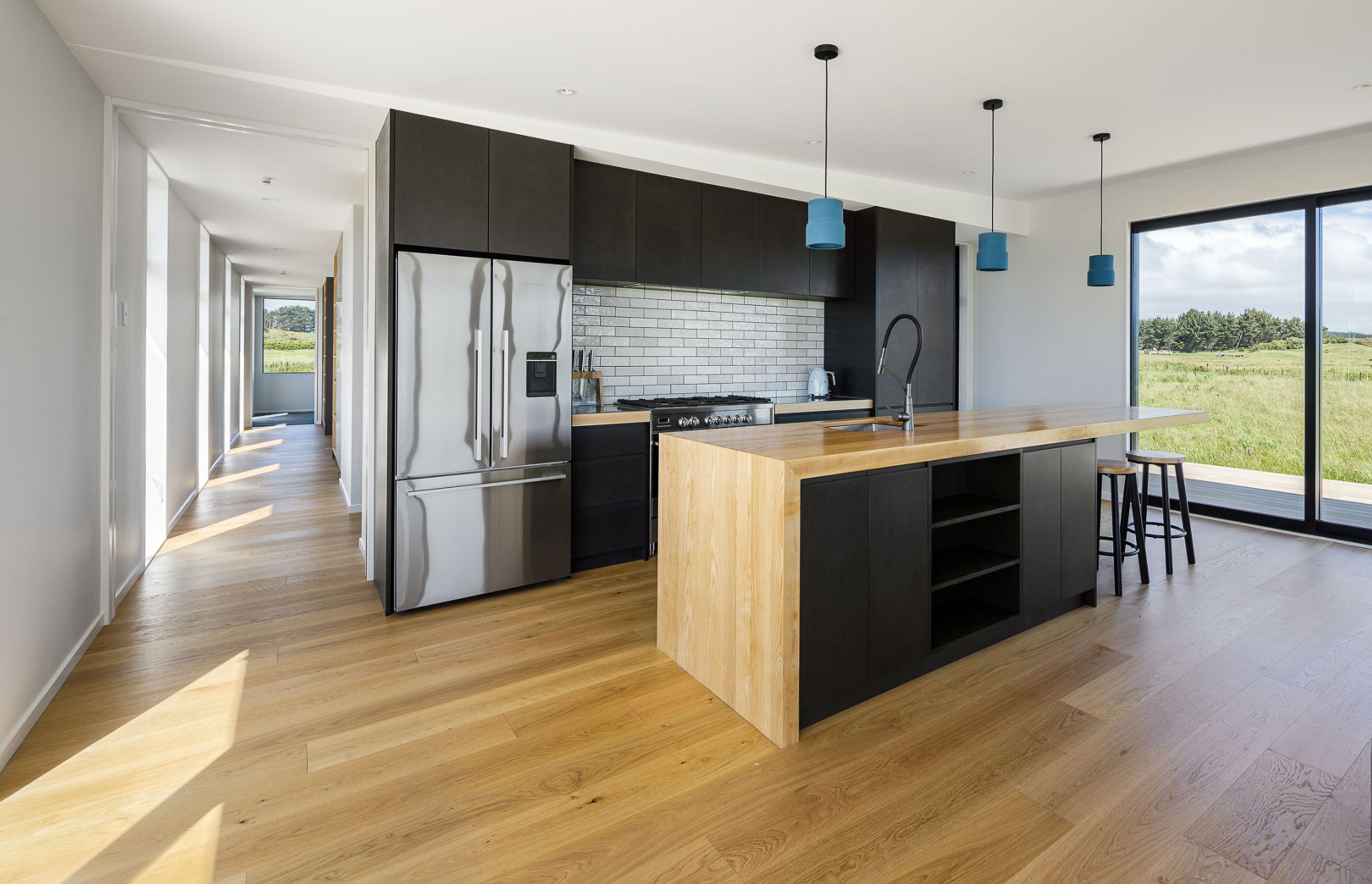 Waikawa Beach Bach by André Vroon Photographer | ArchiPro NZ