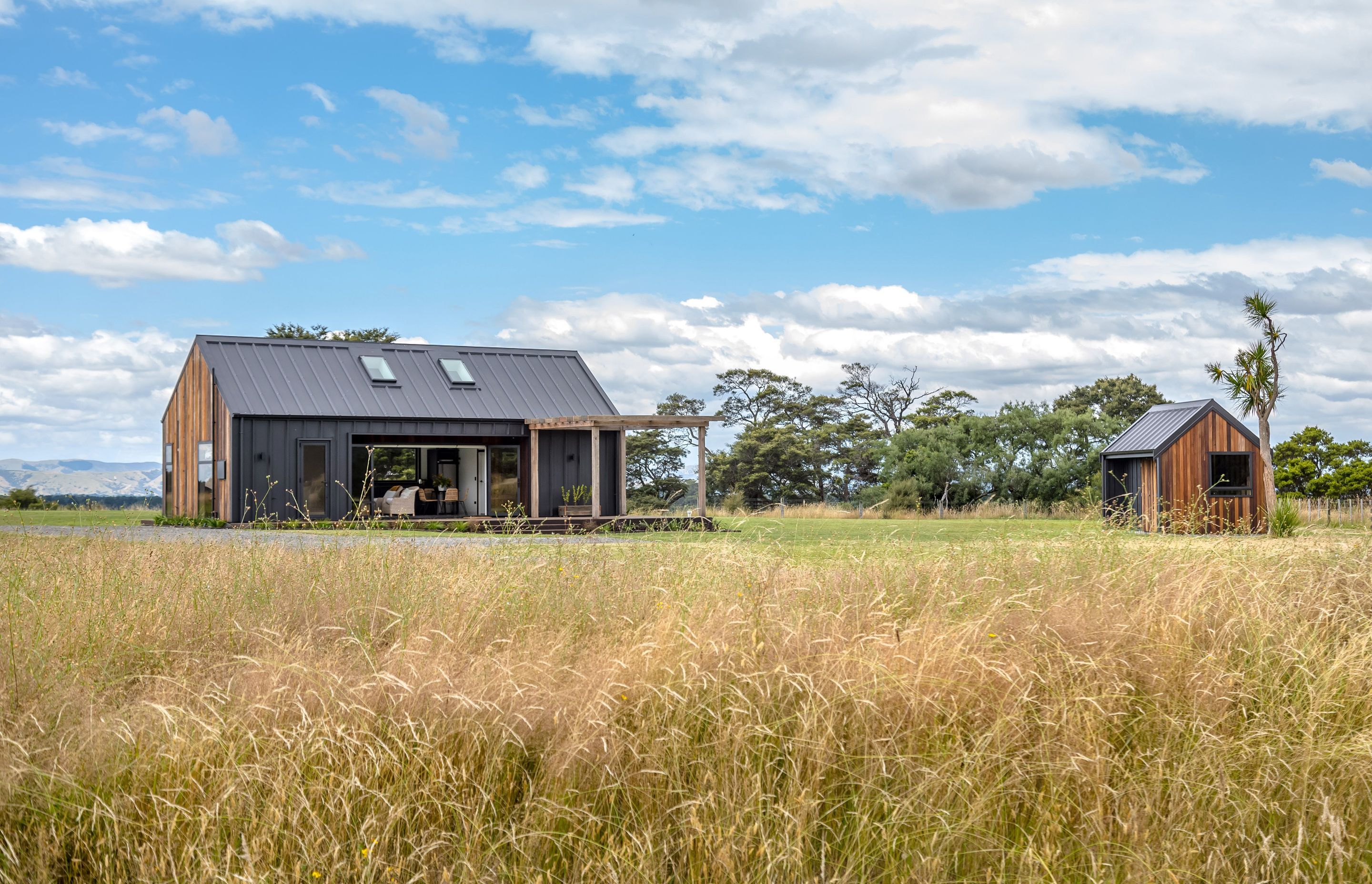Kāhu Cottage by Hardwood Timbers NZ | ArchiPro NZ