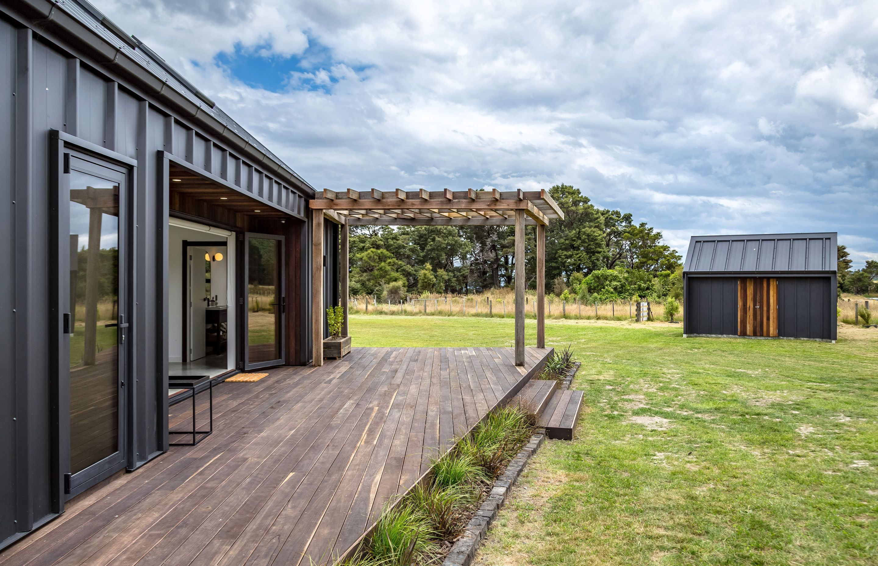 Kāhu Cottage by Hardwood Timbers NZ | ArchiPro NZ
