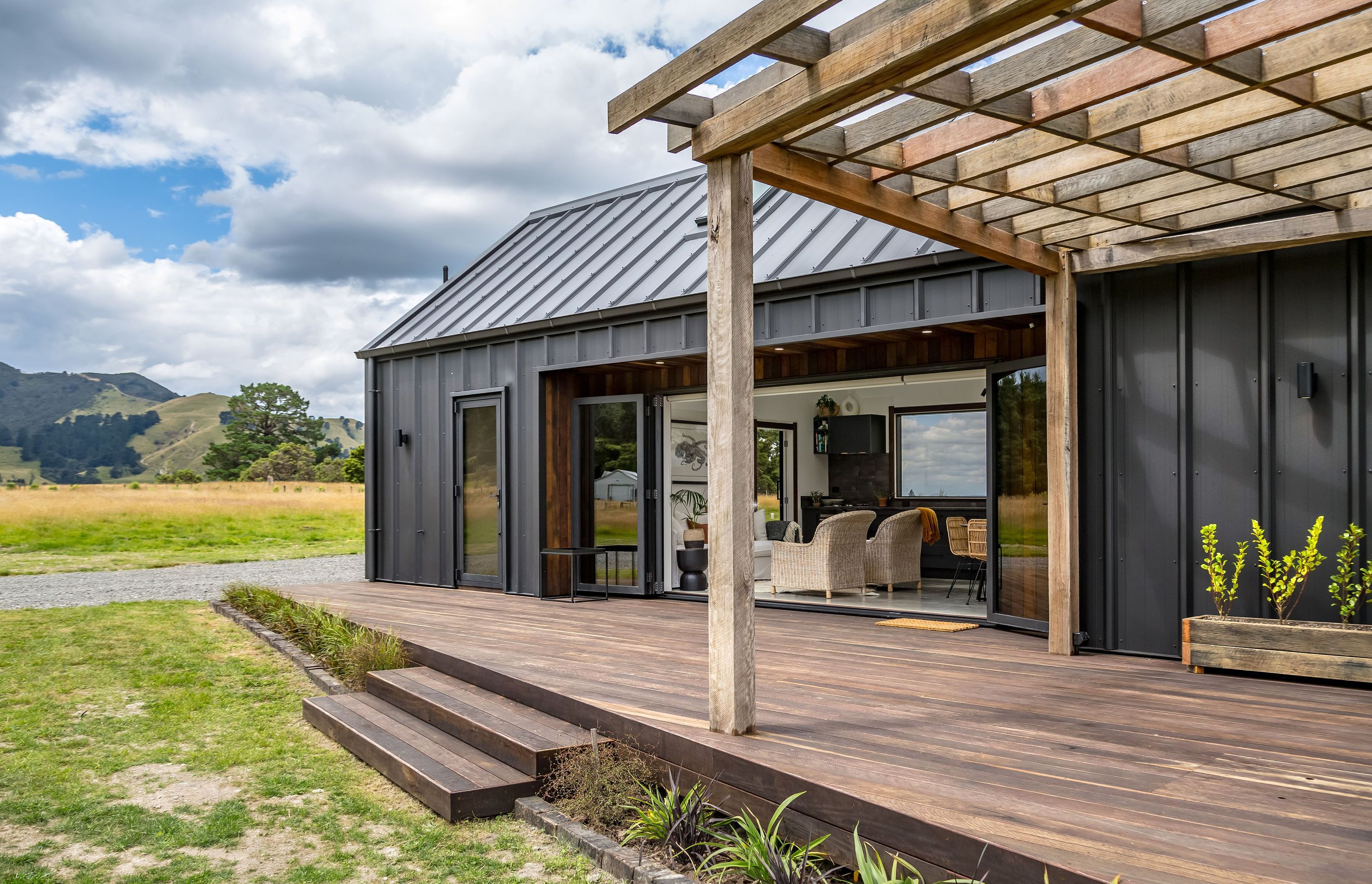 Kāhu Cottage by Hardwood Timbers NZ | ArchiPro NZ