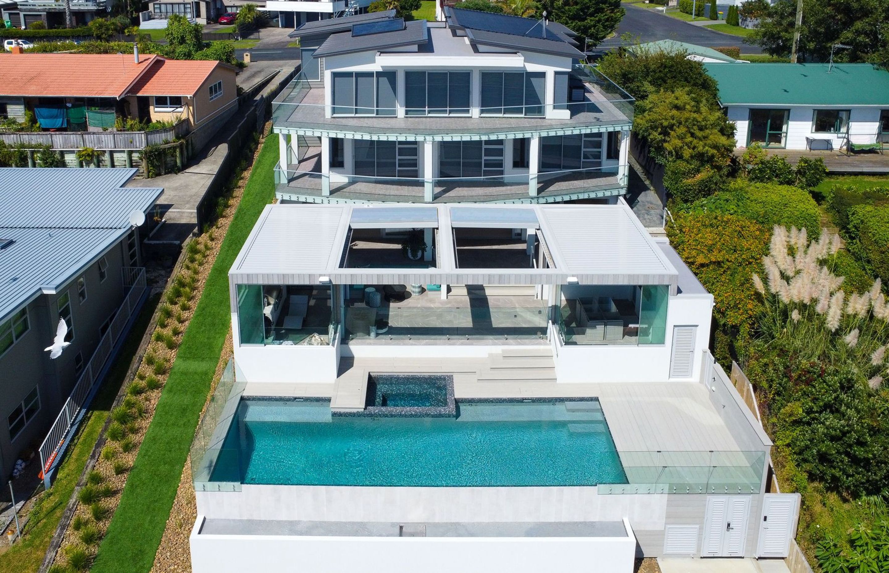 Clarks Beach Infinity Pool by Alfresco Pools | ArchiPro NZ