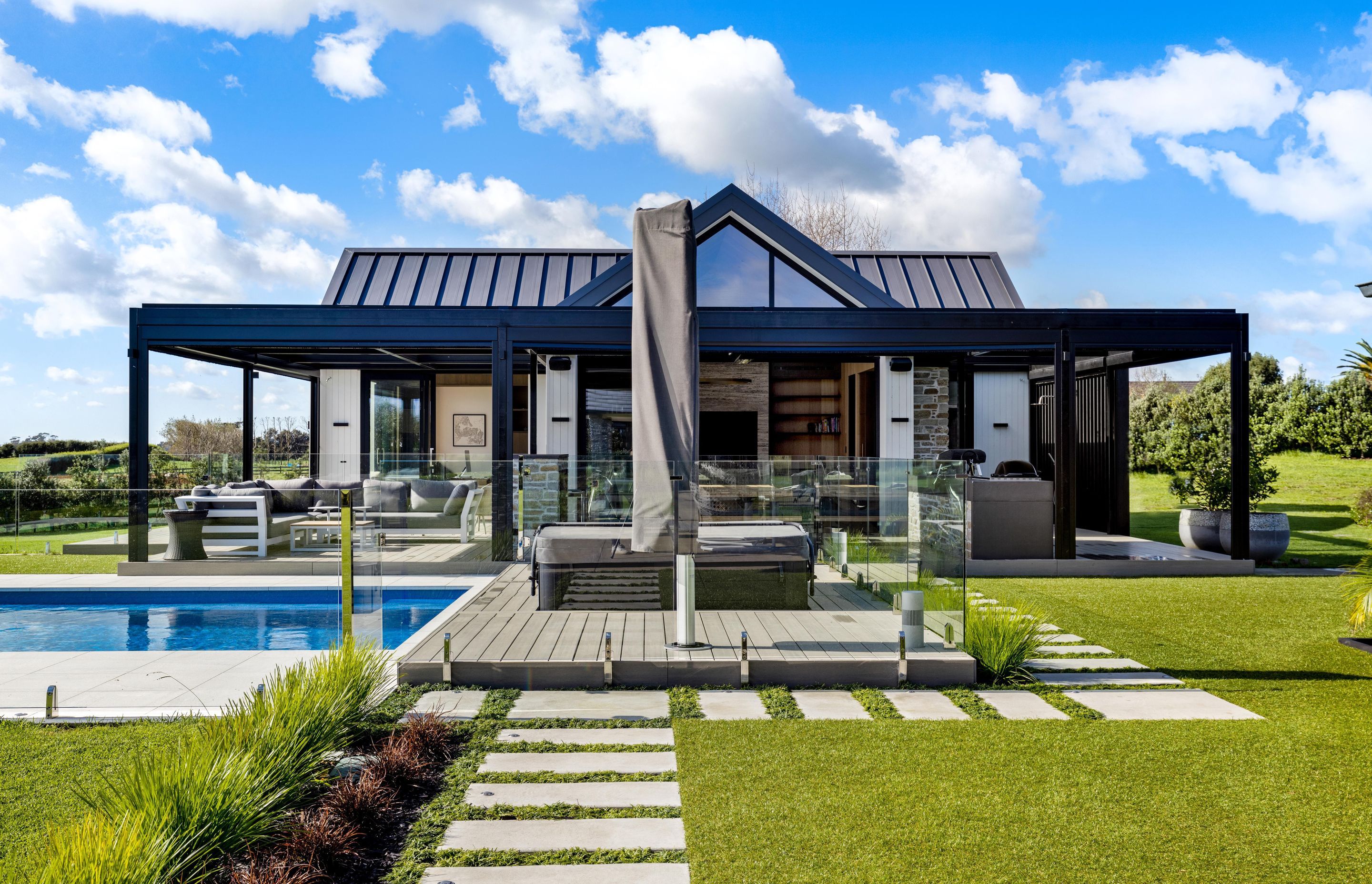 Karaka Boutique Pool House by Lewis Build | ArchiPro NZ