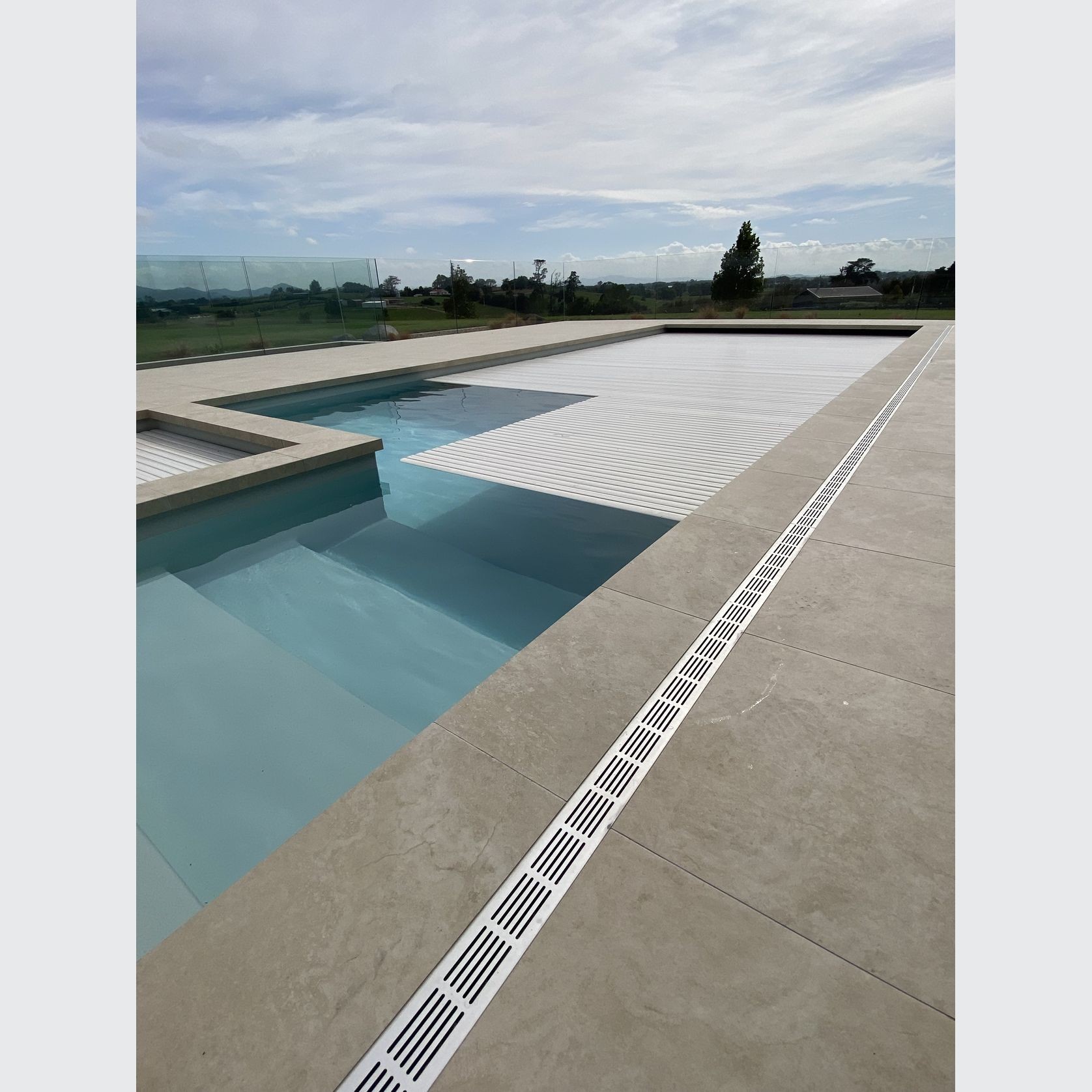Automated Solid Slat Pool Cover | ArchiPro NZ