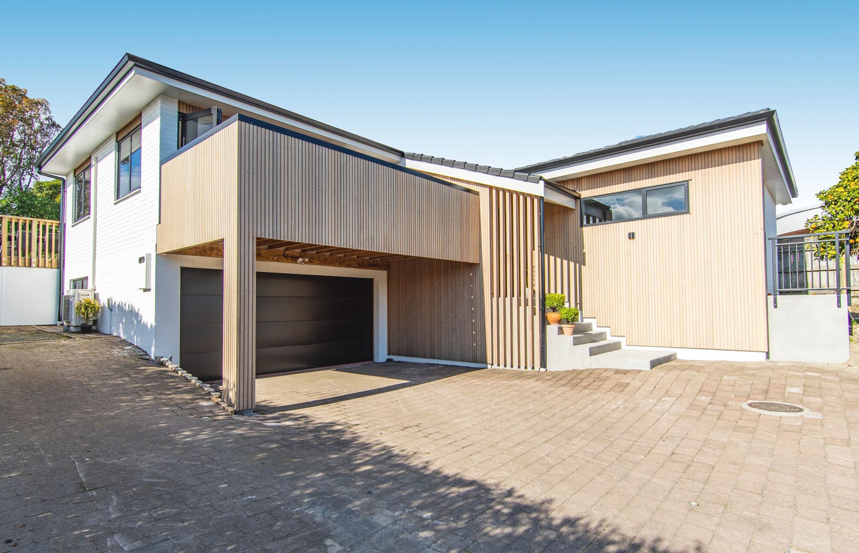 The Benefits of Re-Cladding Davy Construction | ArchiPro NZ