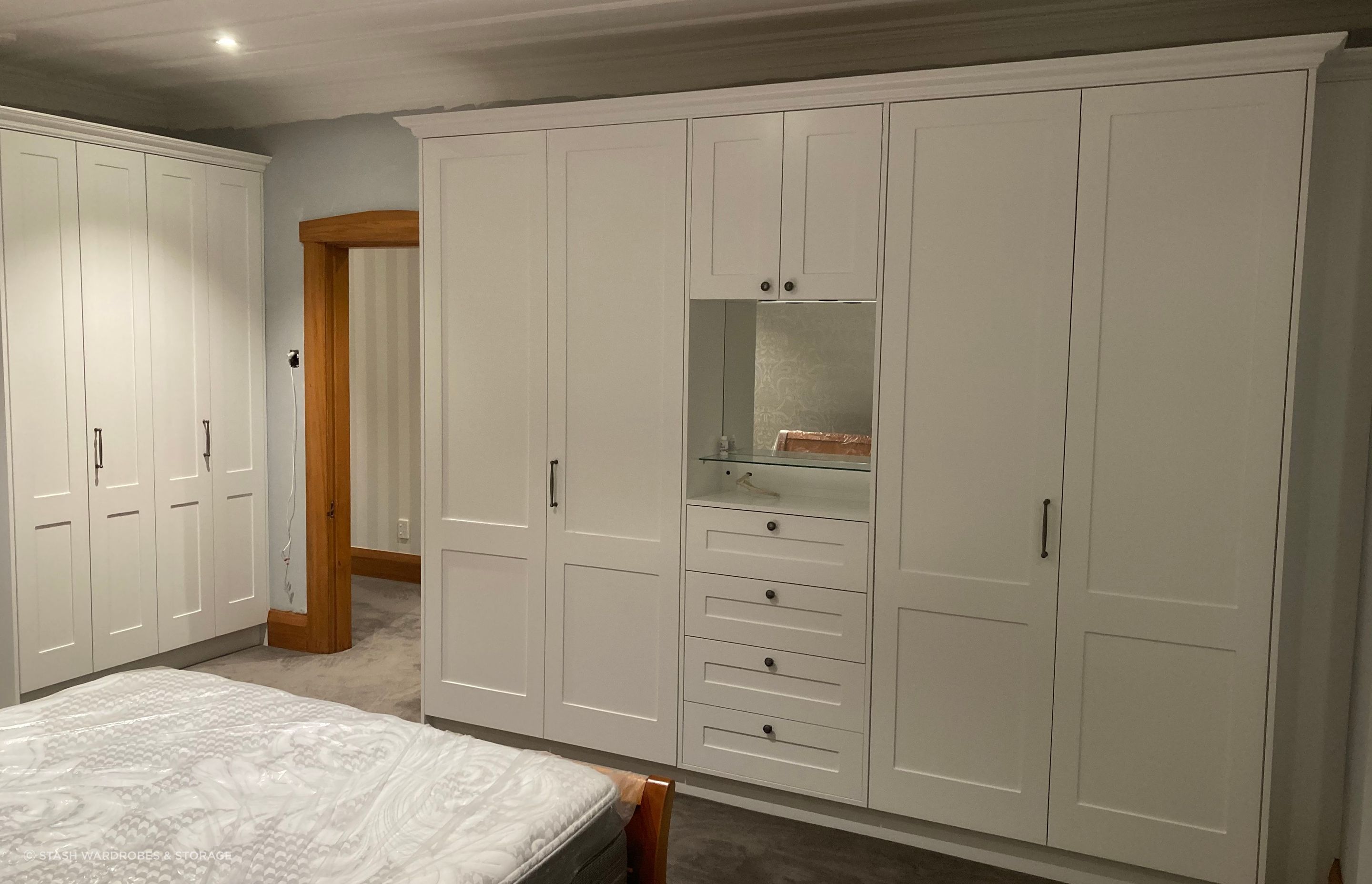 Bifold Doors by Stash Wardrobes & Storage | ArchiPro NZ