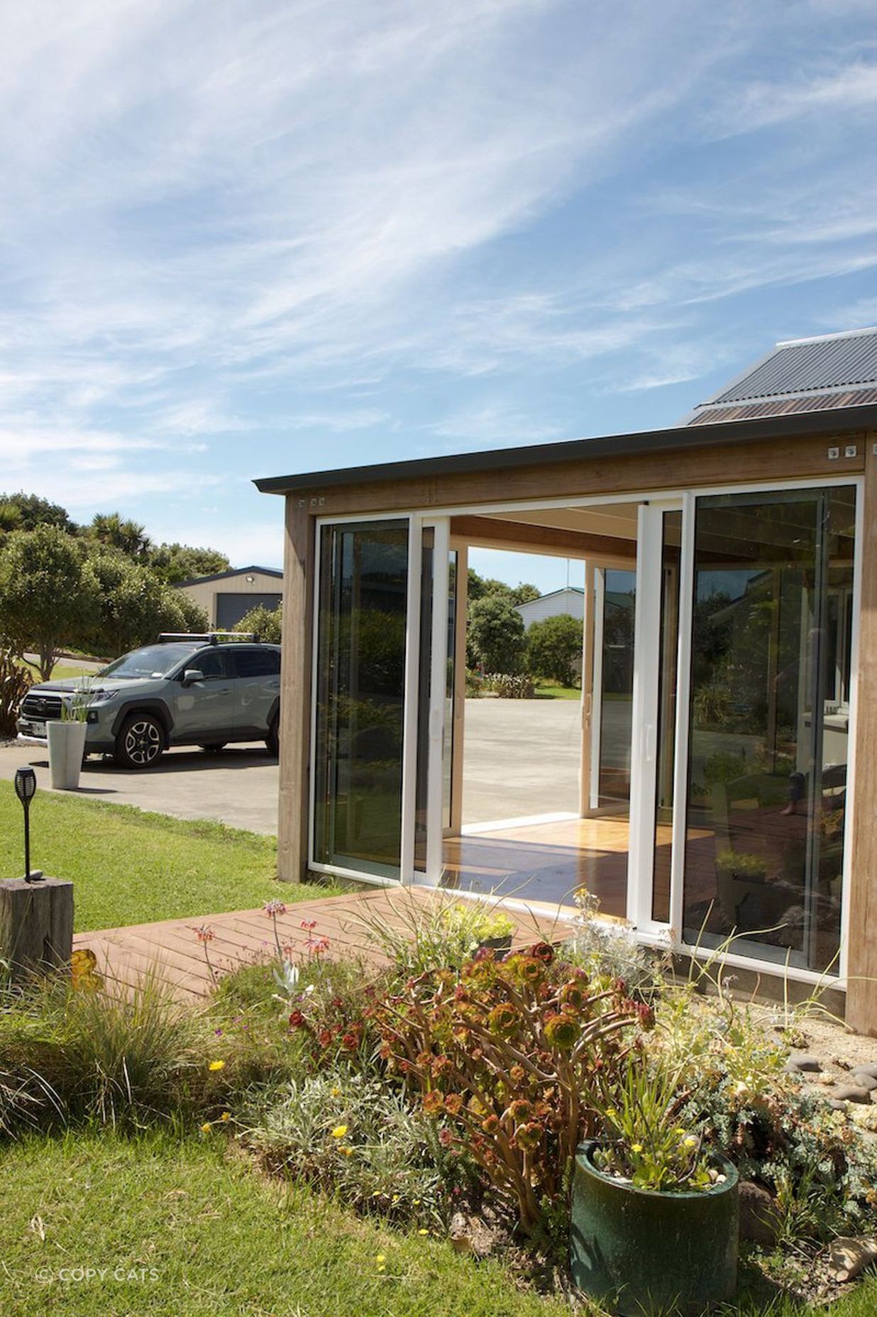 Seaside Conservatory by Ryan Construction | ArchiPro NZ