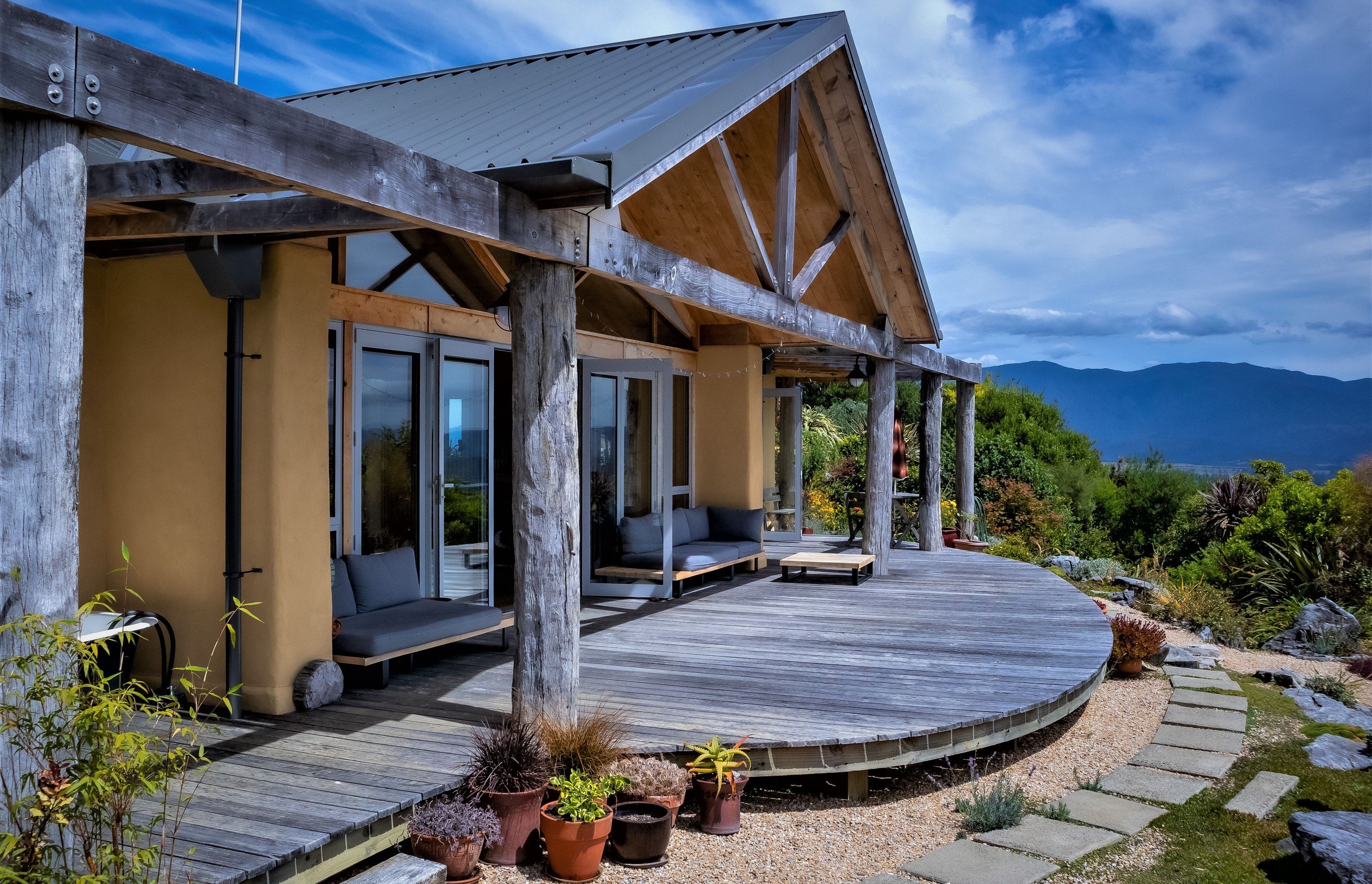 Clifftop House by Solid Earth Adobe Buildings | ArchiPro NZ