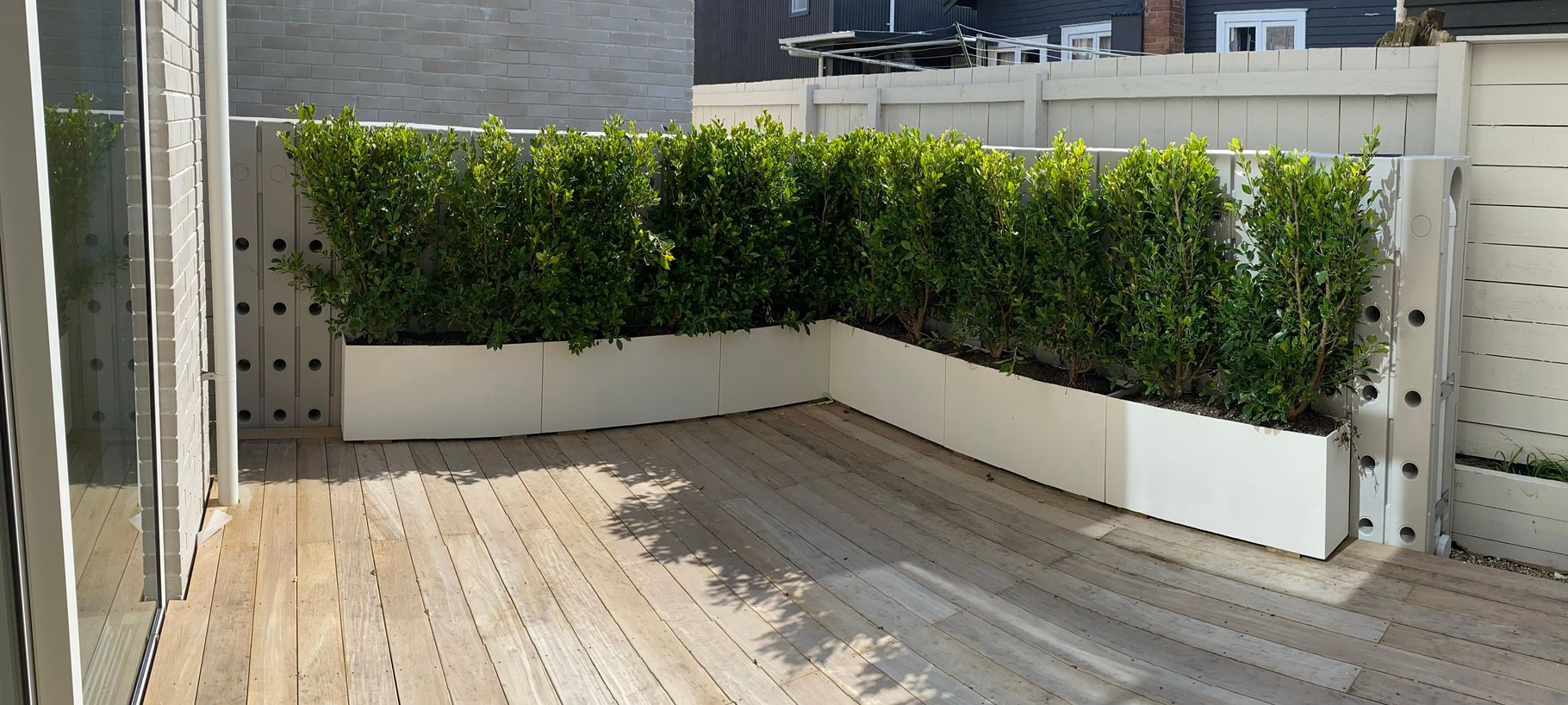 Water detention hidden inside a fence