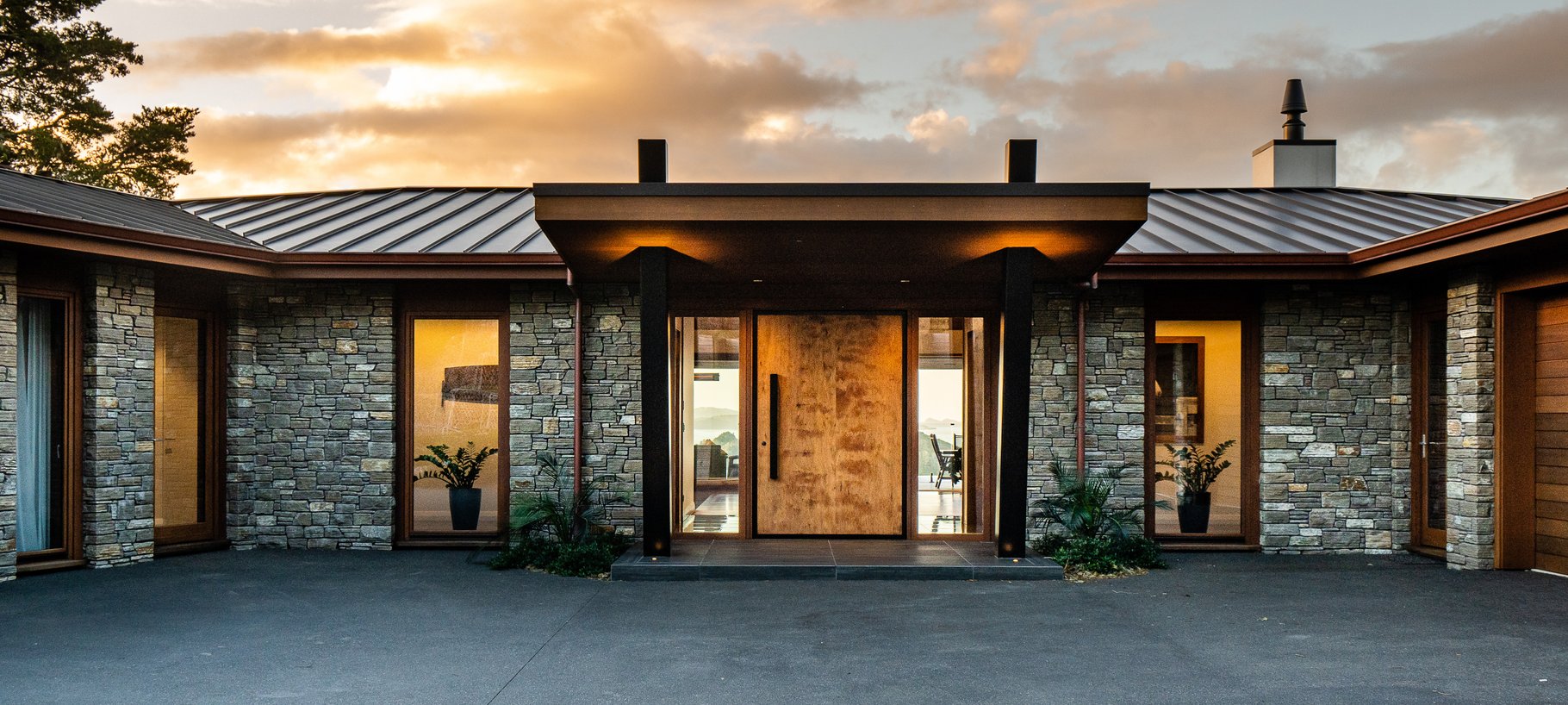 Refined industrial chic immersed in a Bay of Islands vista