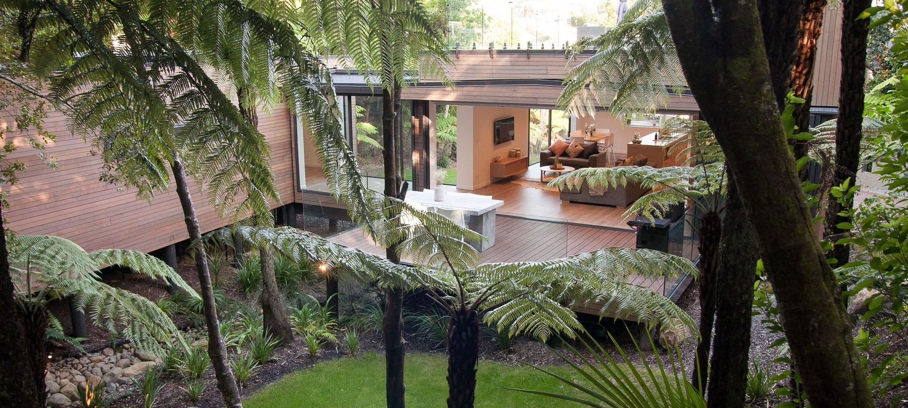 Embraced by native bush, this stunning home is at one with the land