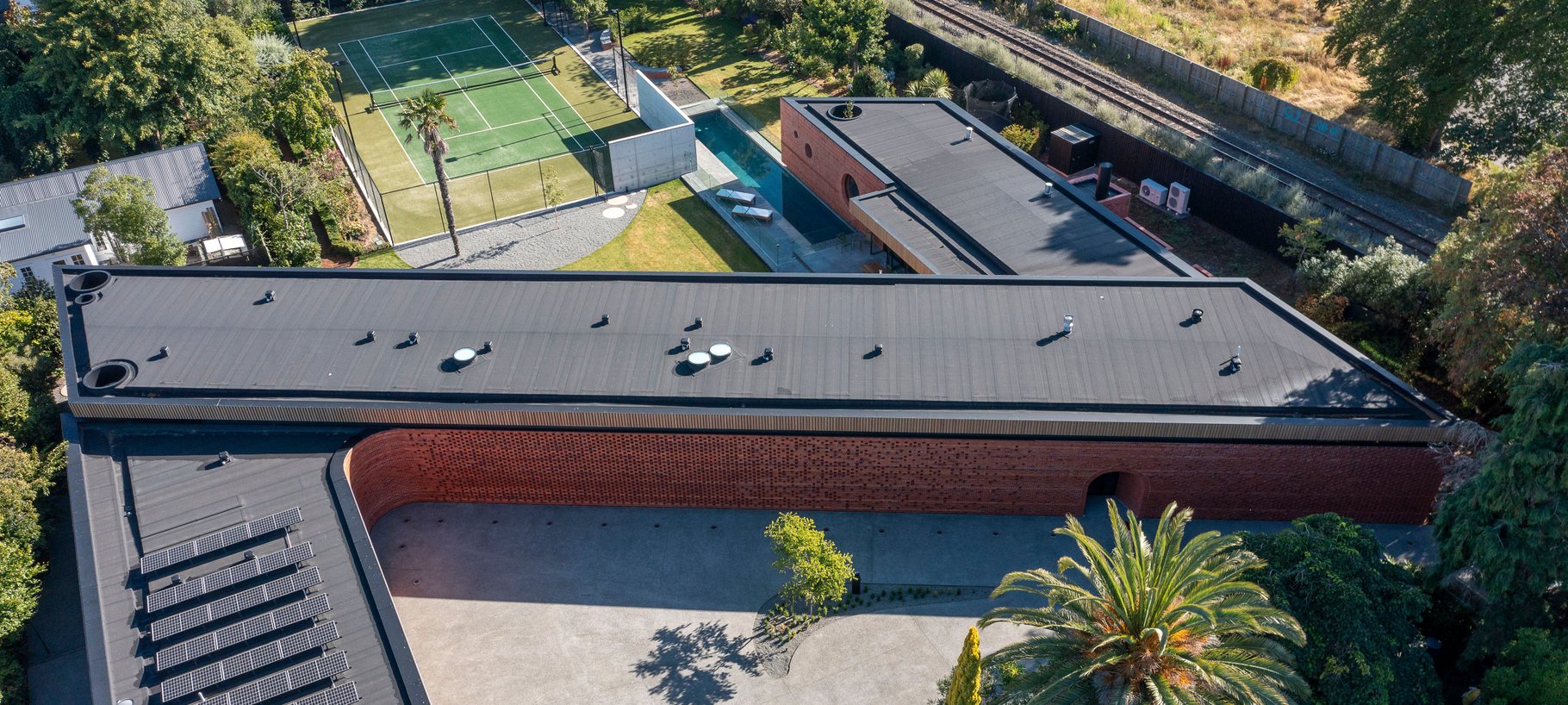 An energy-efficient roof is the cherry atop this unique Z-shaped home