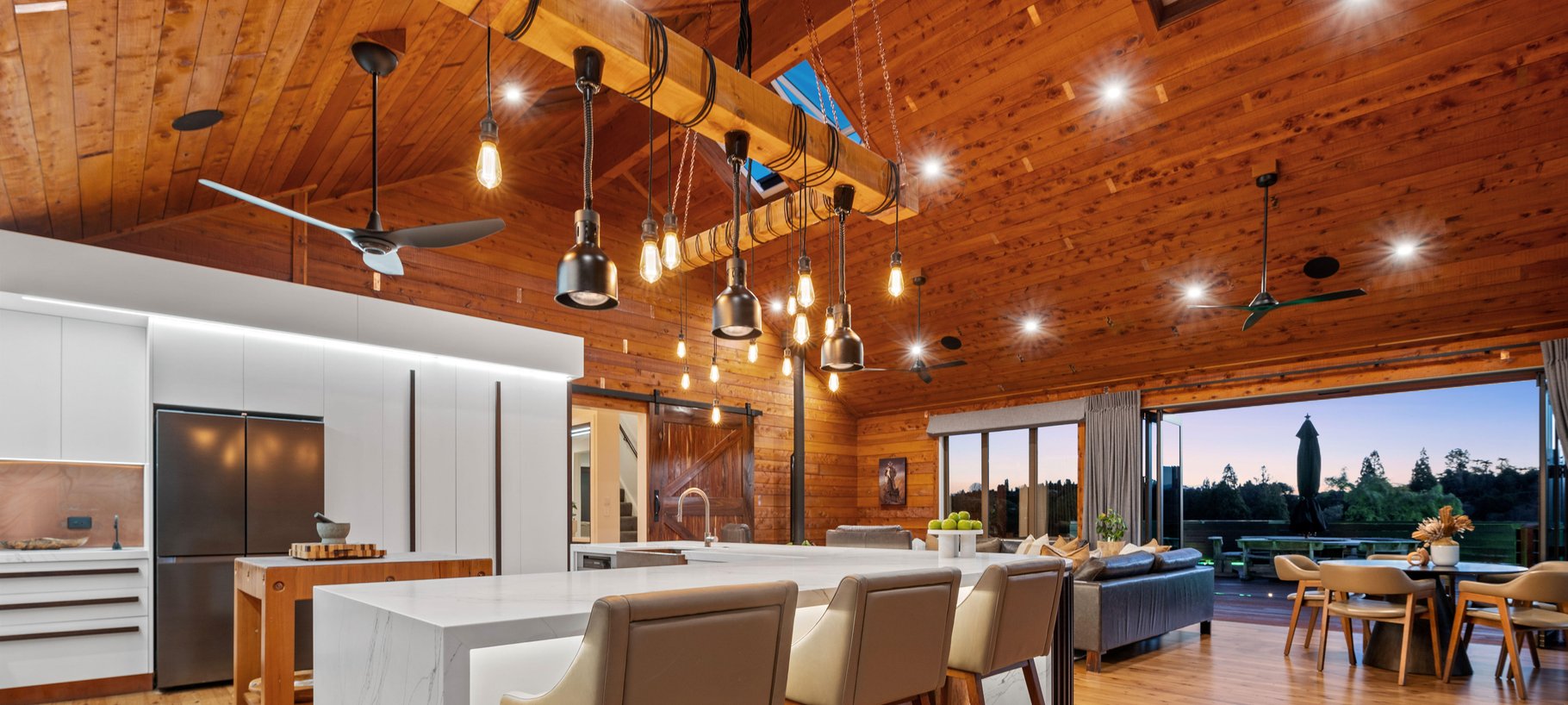 Macrocarpa timber stars in this award-winning 1184sqm lodge