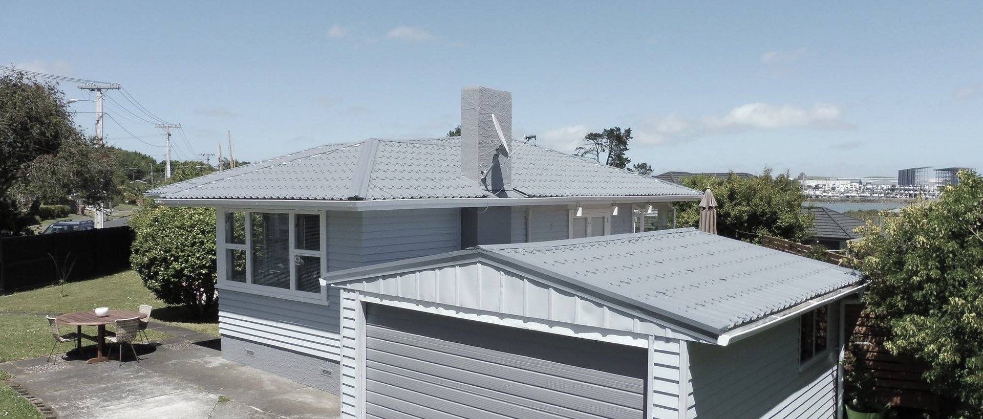 Suburban Blue House by On Point Painters | ArchiPro NZ