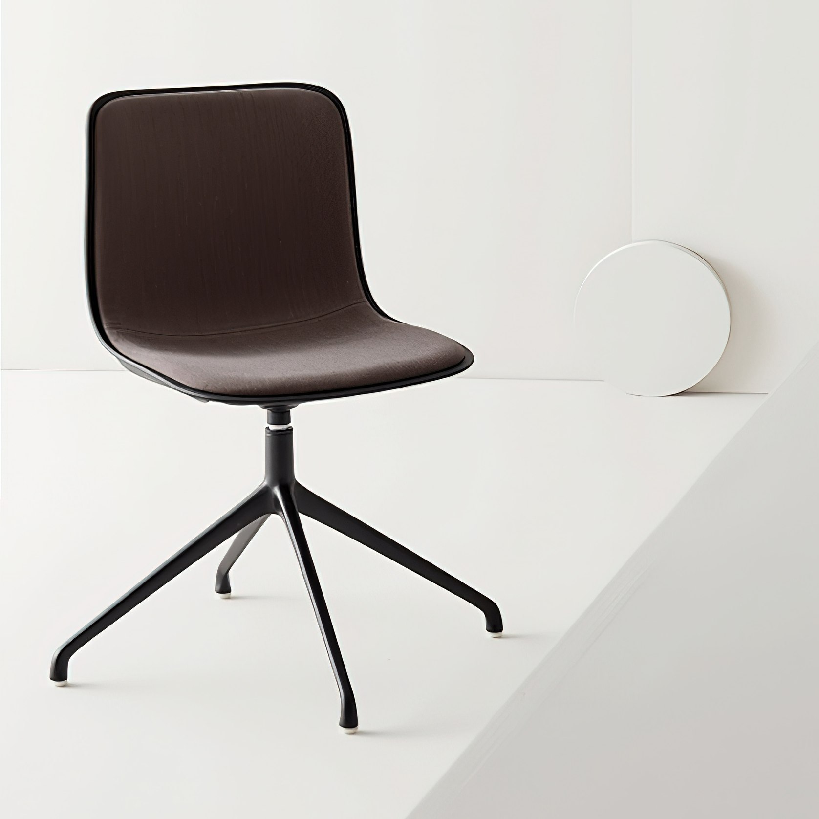 Dragonfly Swivel Chair by Segis | ArchiPro NZ