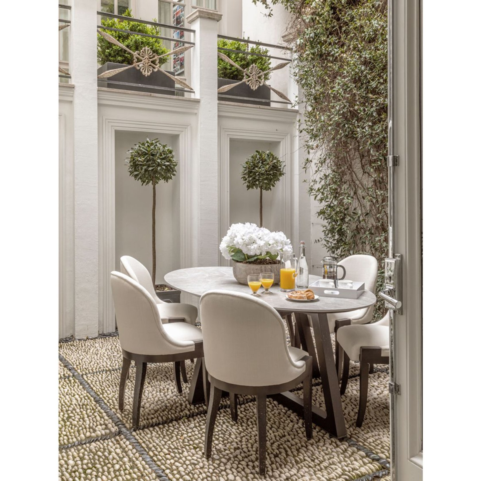 Corvus Porcelain Dining Table by Coco Wolf | ArchiPro NZ