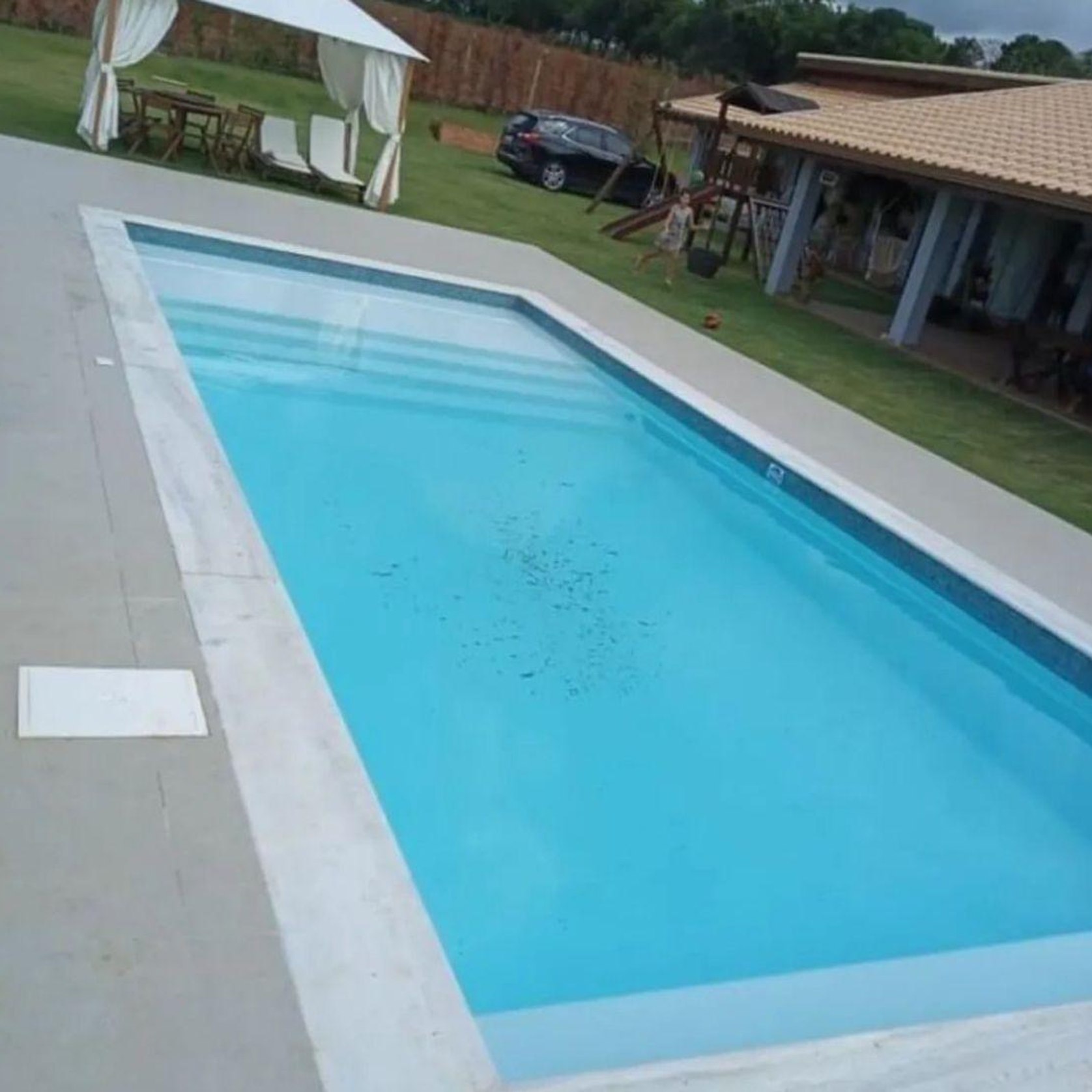 Tile Line Swimming Pools with Tanning ledge | ArchiPro NZ