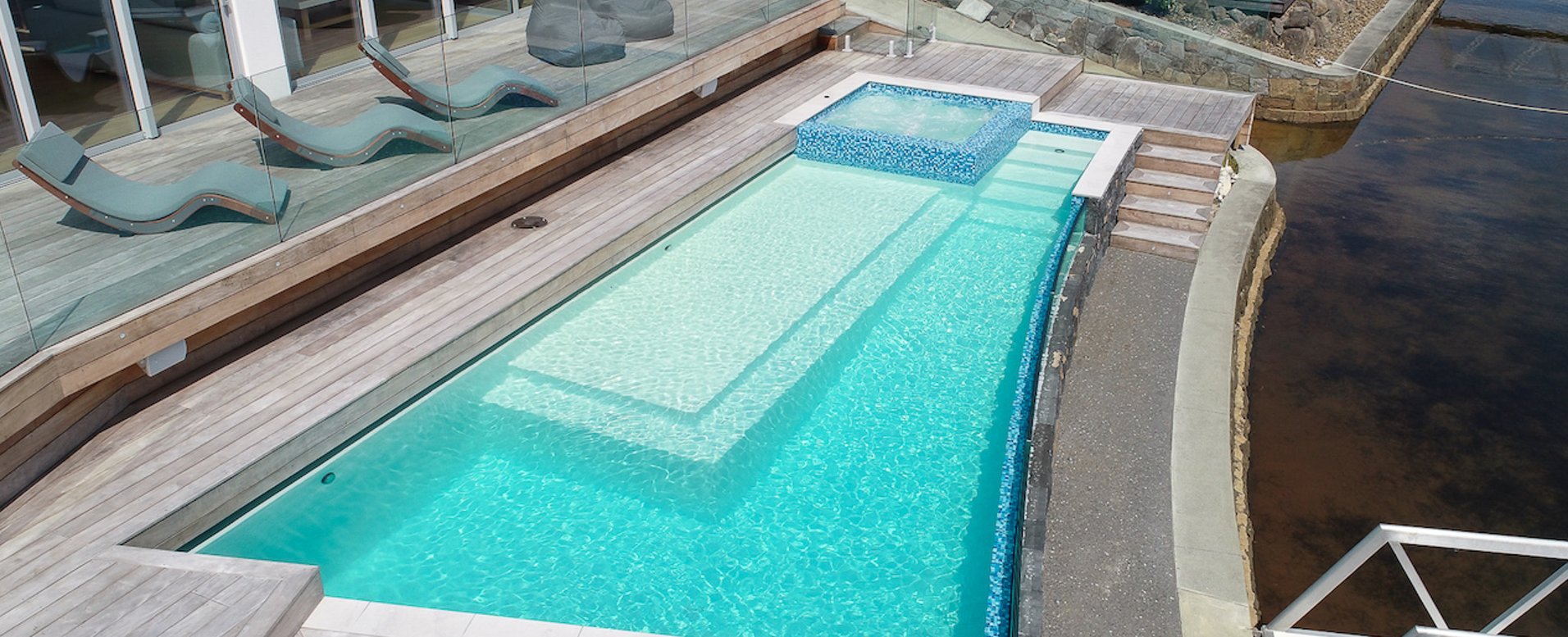 An Elegant Waterfront Edge by Mayfair Pools | ArchiPro NZ
