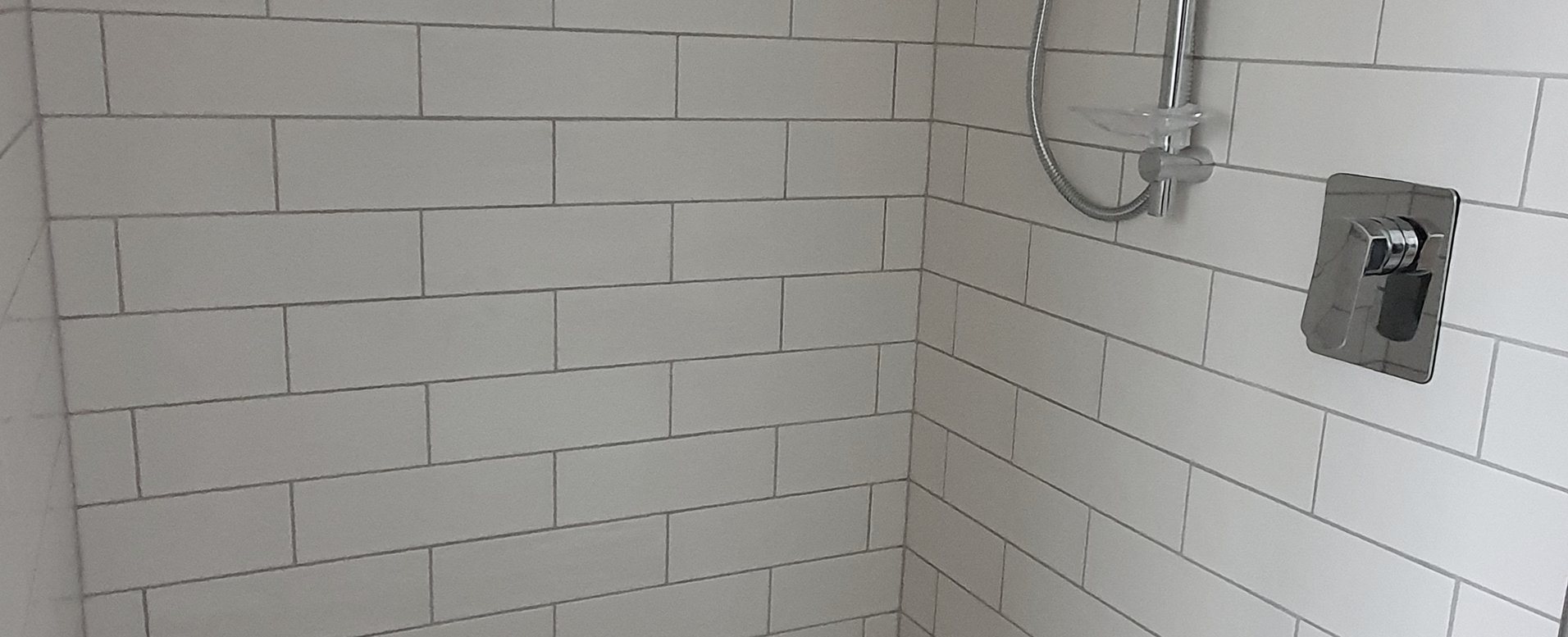 Sumner shower by Colin Barber | ArchiPro NZ