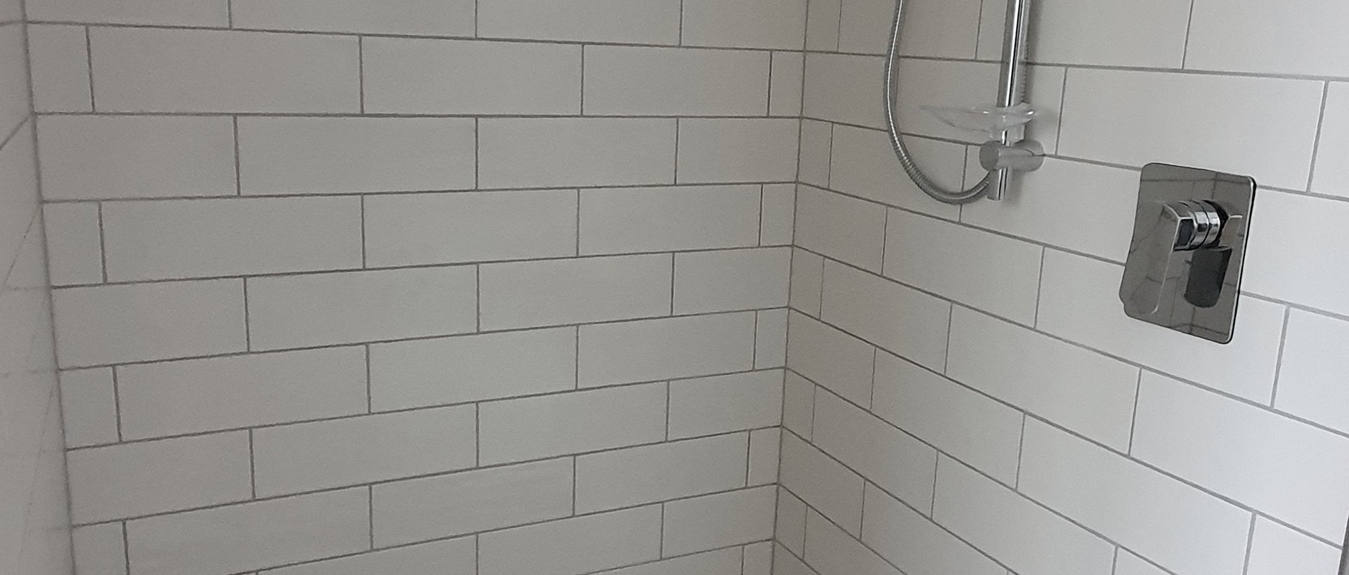 Sumner shower by Colin Barber | ArchiPro NZ