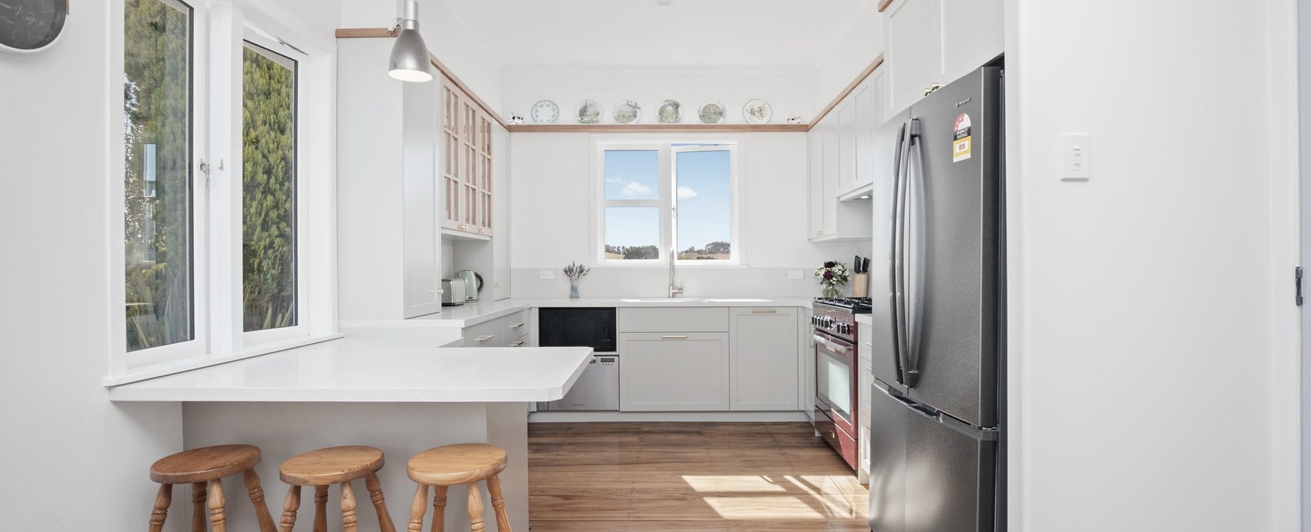 A Kitchen Refresh With Rimu Floorboard Restoration In Auckland by ...