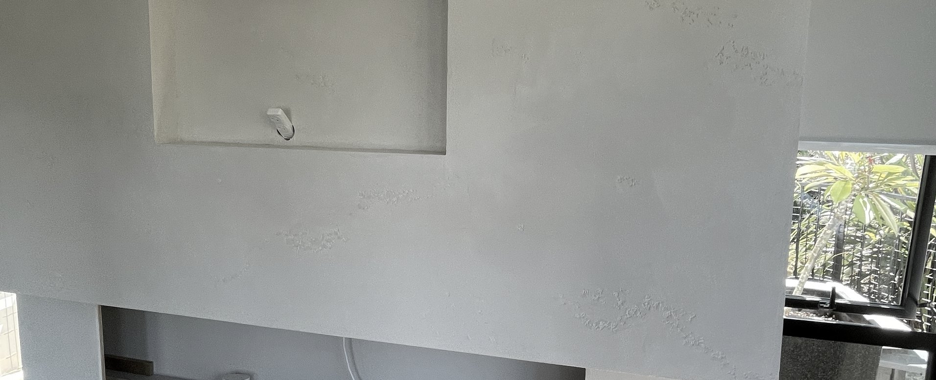 Resistone microcement fireplace | ArchiPro NZ