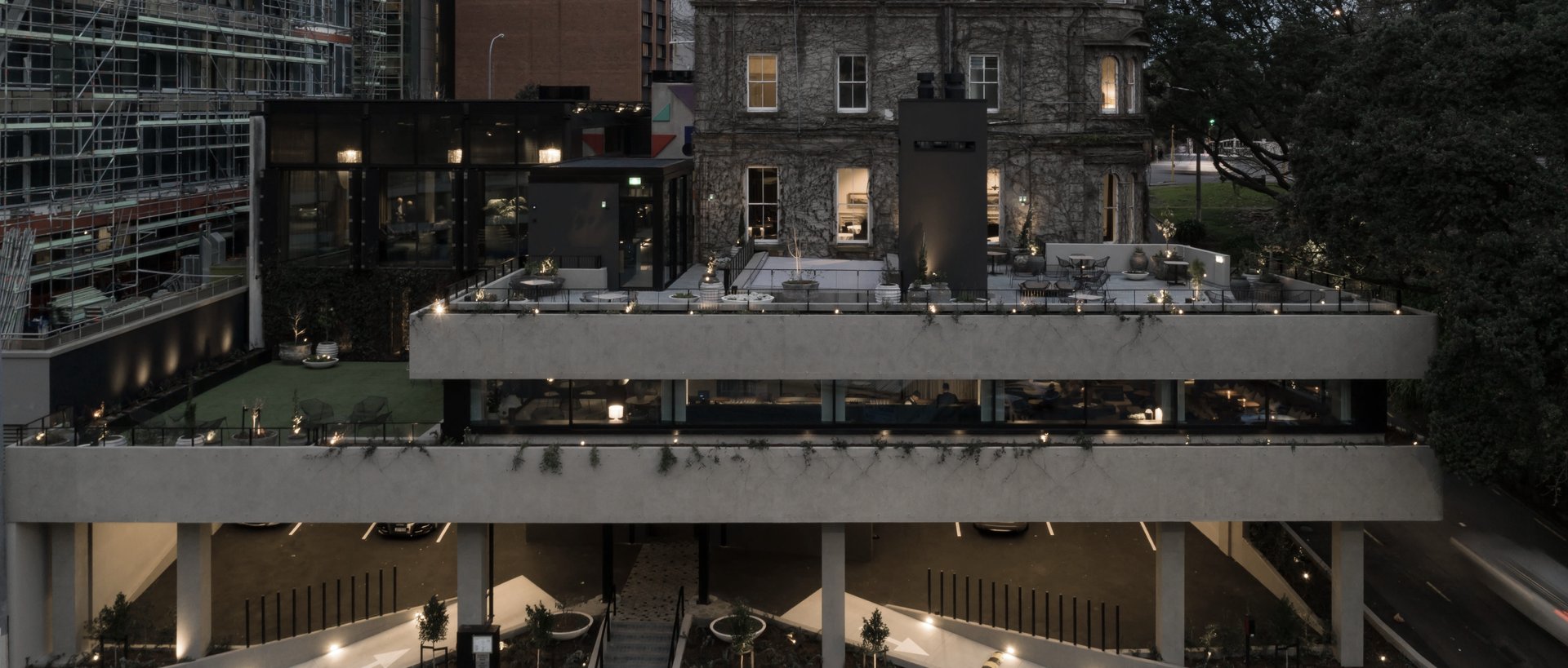 Northern Club Bankside Extension - balustrade, bollard and green facade ...